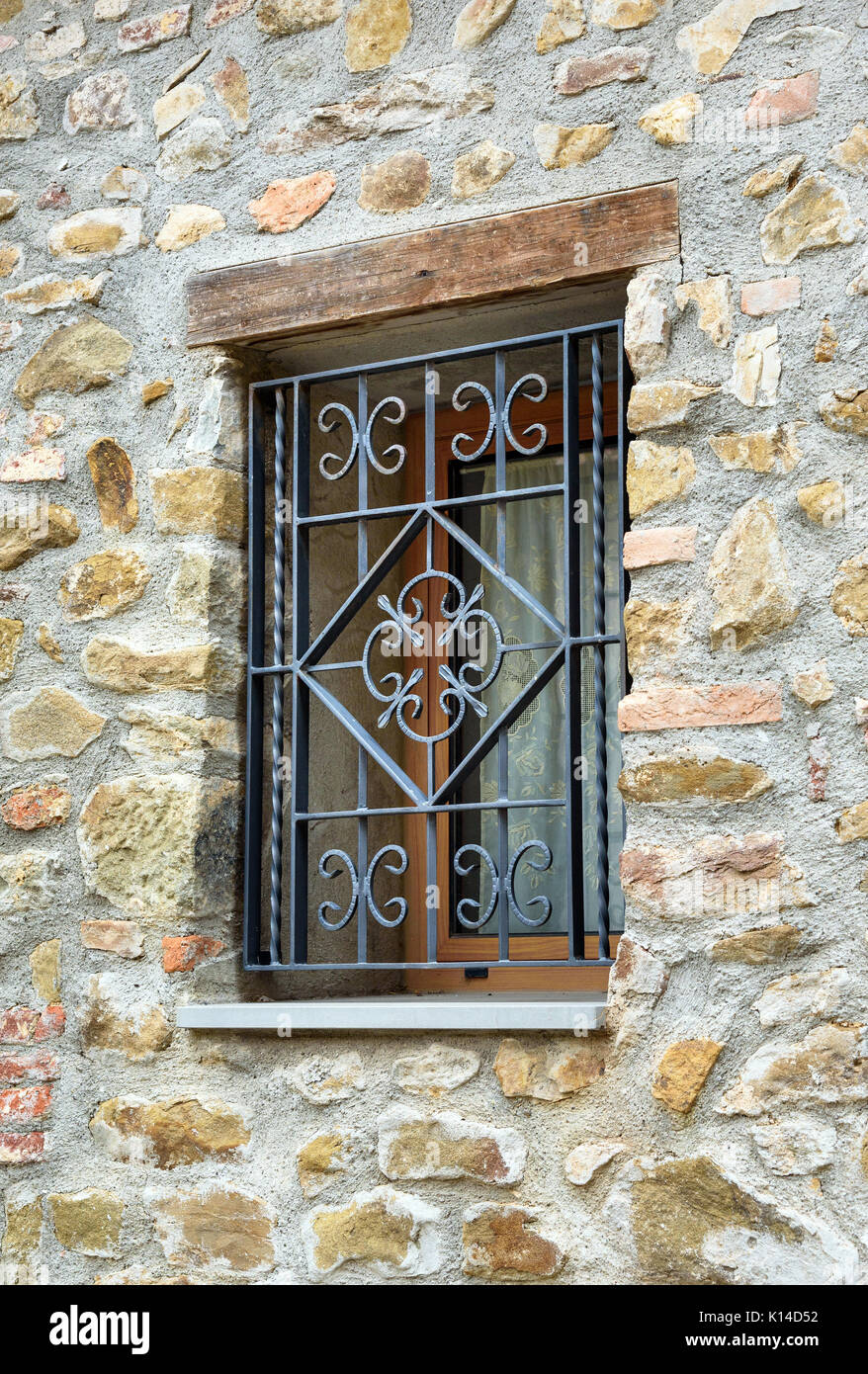 window with iron grating on stone wall Stock Photo - Alamy