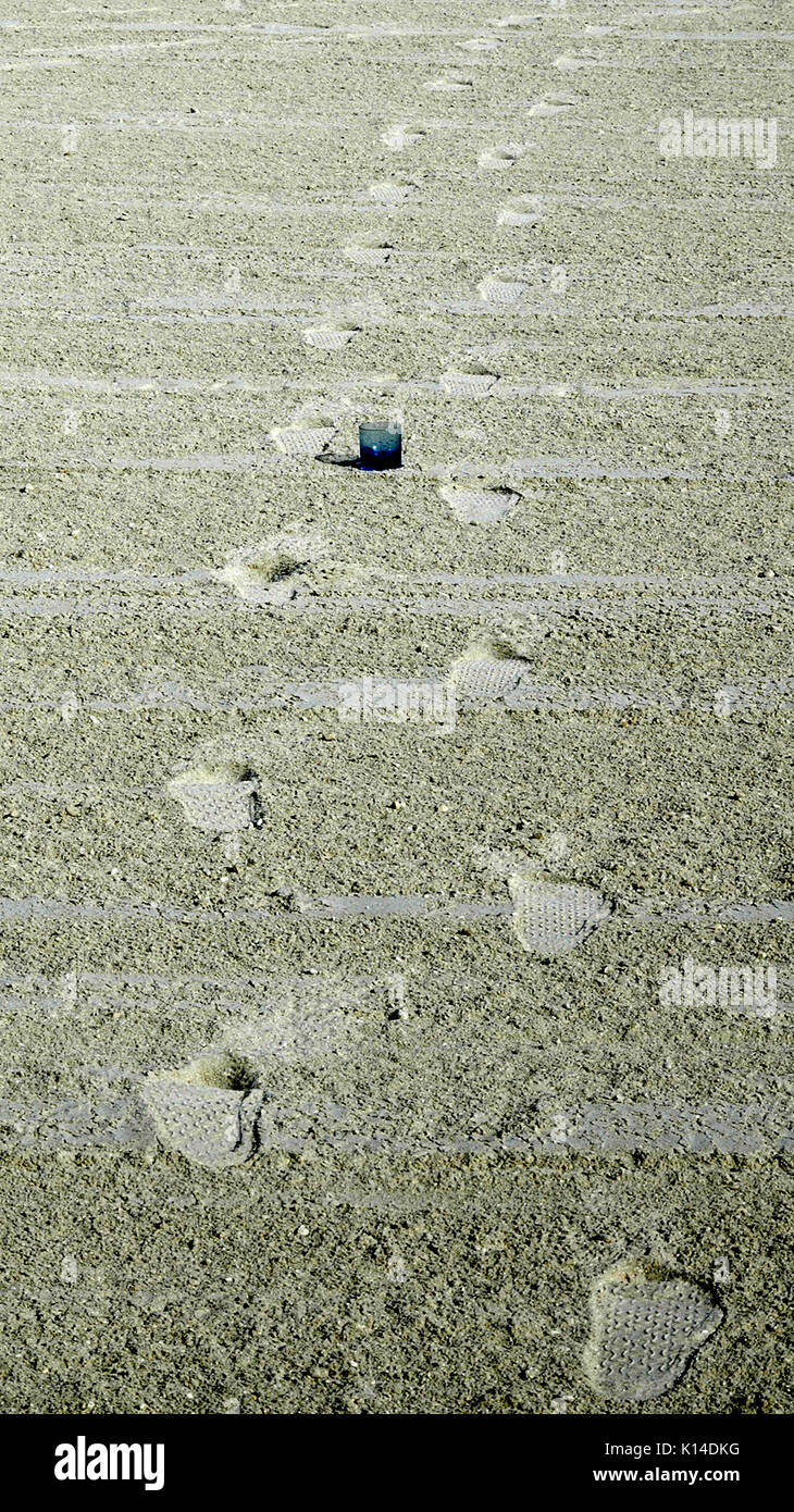 Blue glass on Dubai beach Stock Photo - Alamy