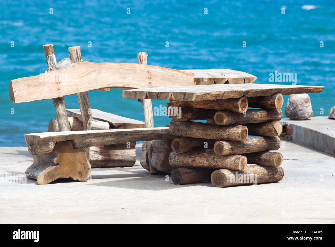 wooden table by the sea Stock Photo - Alamy