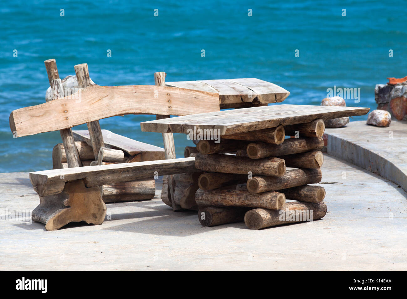 wooden table by the sea Stock Photo - Alamy