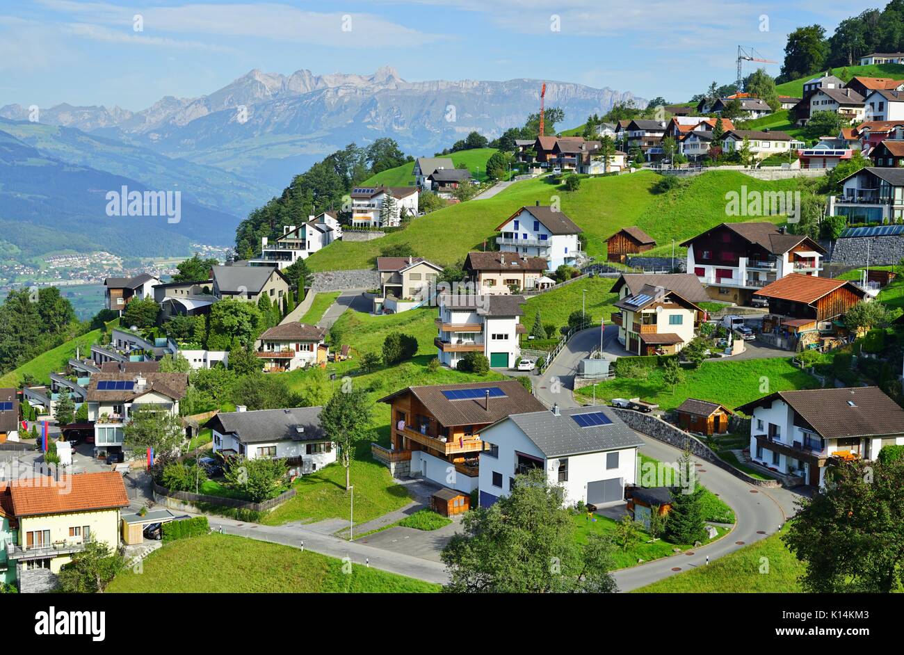 Landscape view of the town of Triesenberg overlooking the Rhine Valley ...