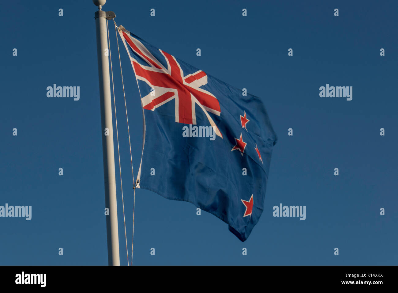 New Zealand flag flying in good breeze Stock Photo - Alamy