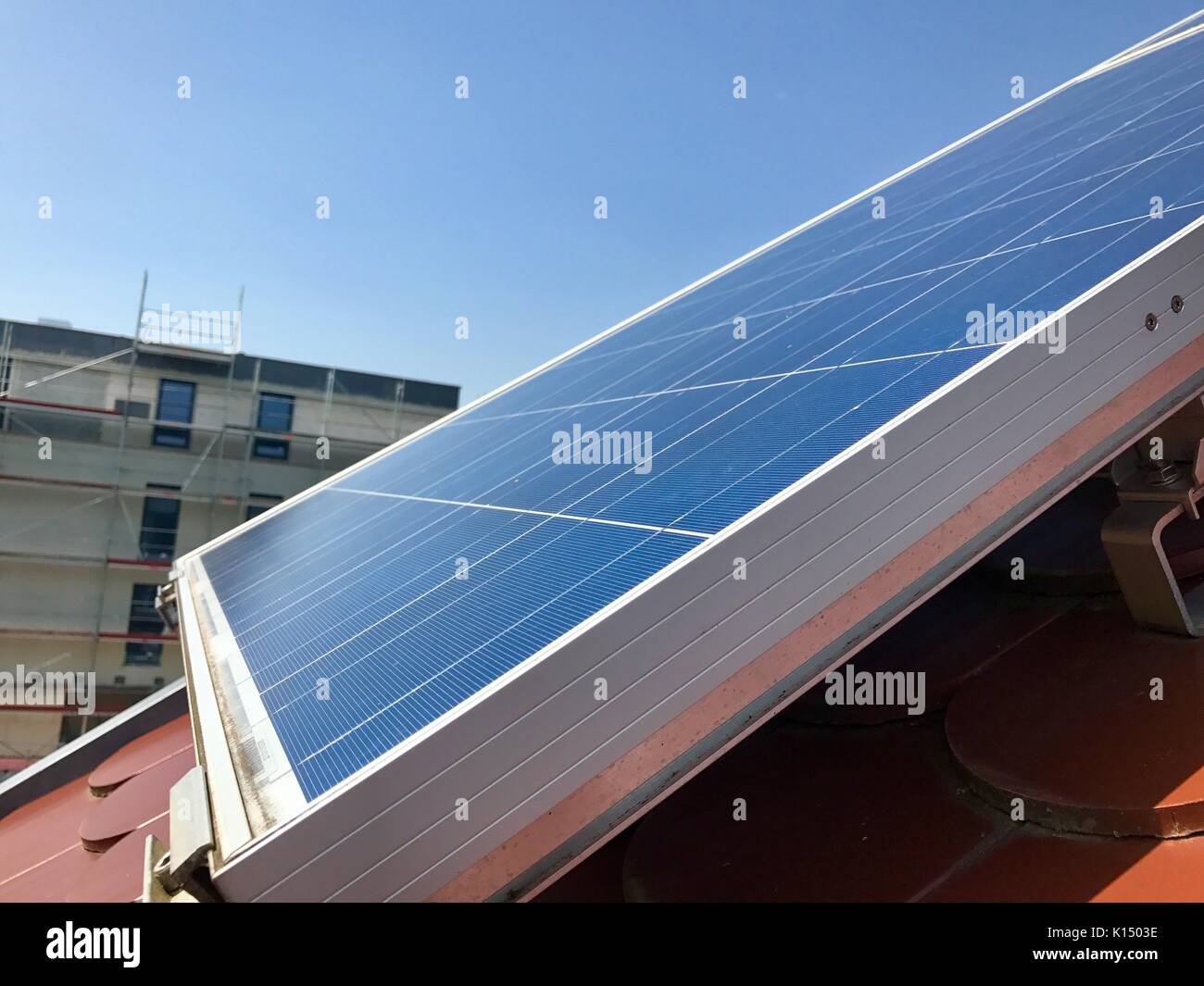 House roof with solar panels on top Stock Photo - Alamy