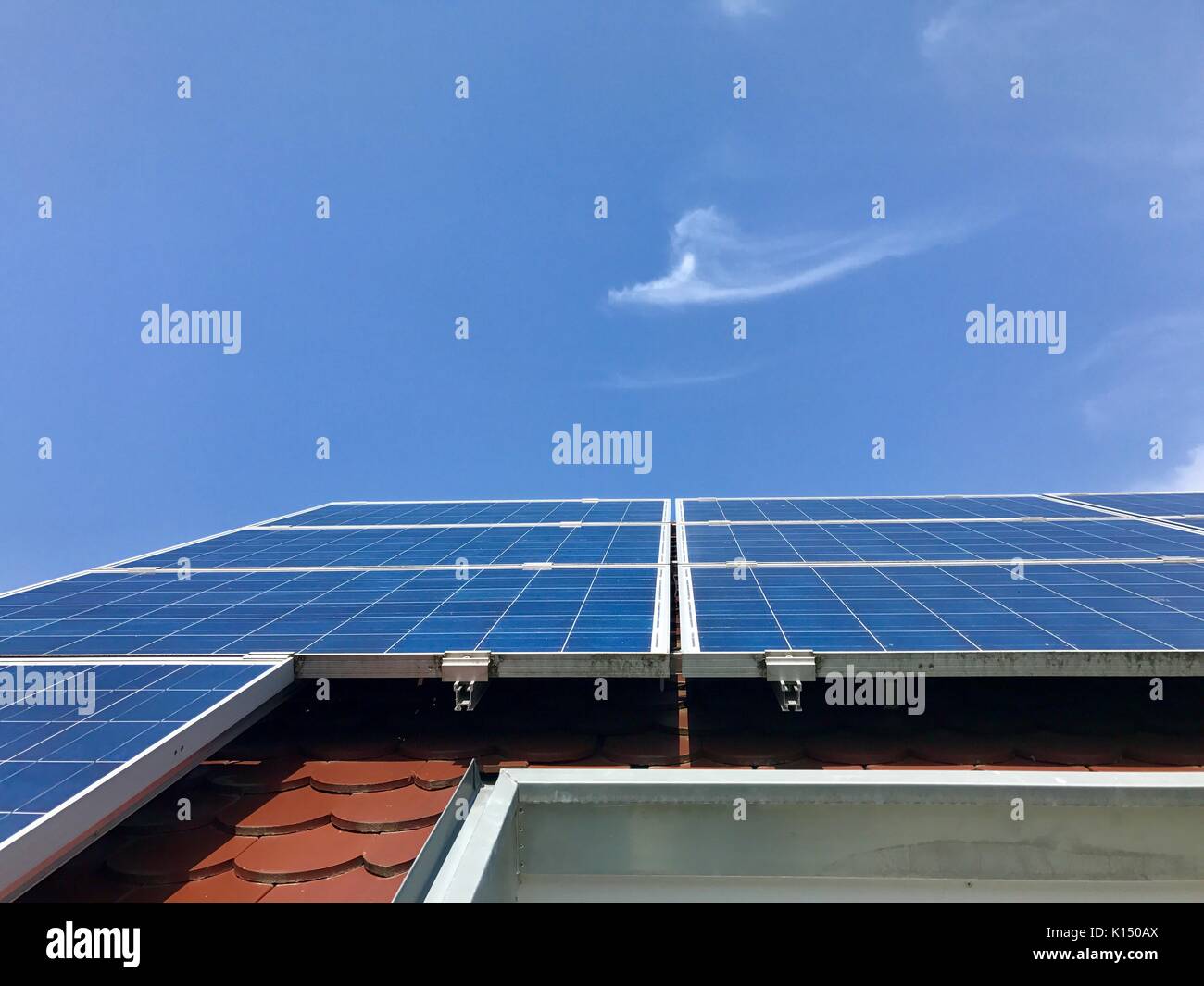 House roof with solar panels on top Stock Photo - Alamy