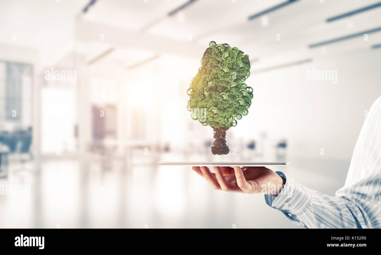 Eco green environment concept presented by tree as working mecha Stock ...