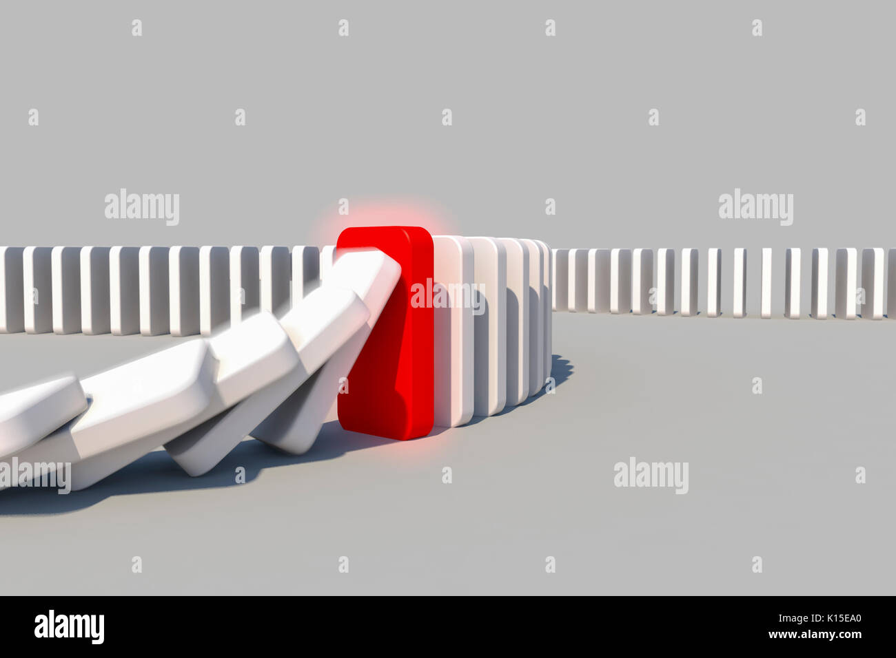 The domino effect in action Stock Photo - Alamy