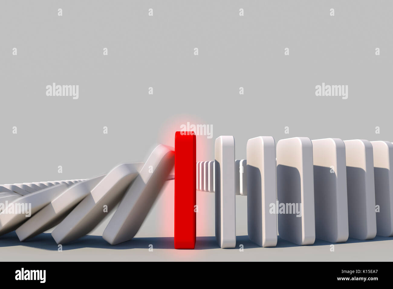 The domino effect in action Stock Photo - Alamy