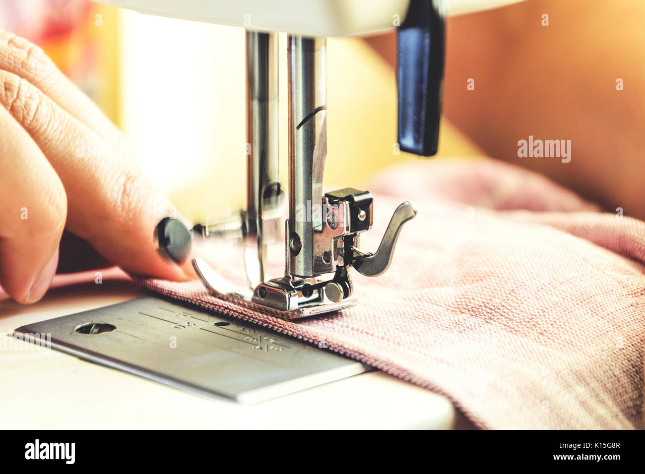 Sewing process on the sewing machine Stock Photo - Alamy