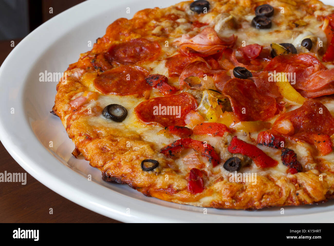 Supreme Pizza top with pepperoni,sausage,bacon,bell peppers,onion and ...