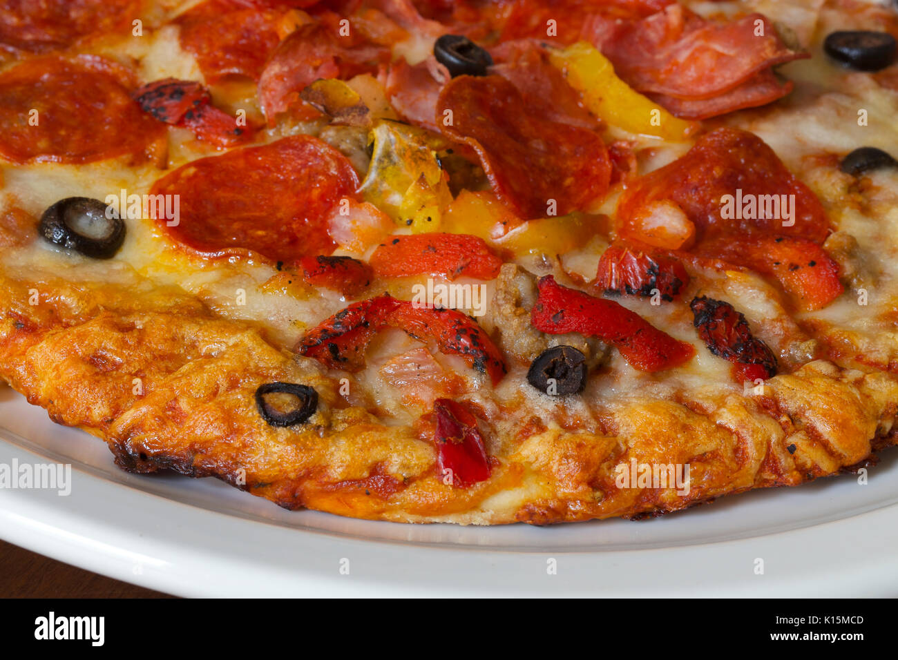 Supreme Pizza top with pepperoni,sausage,bacon,bell peppers,onion and ...
