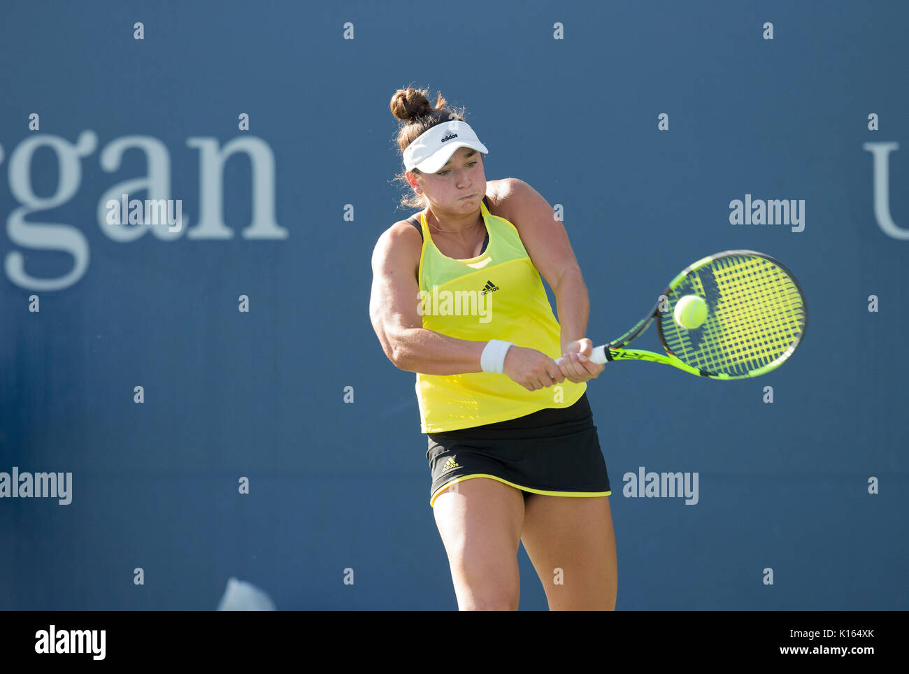 Caroline Dolehide of USA returns ball during qualifying game against ...
