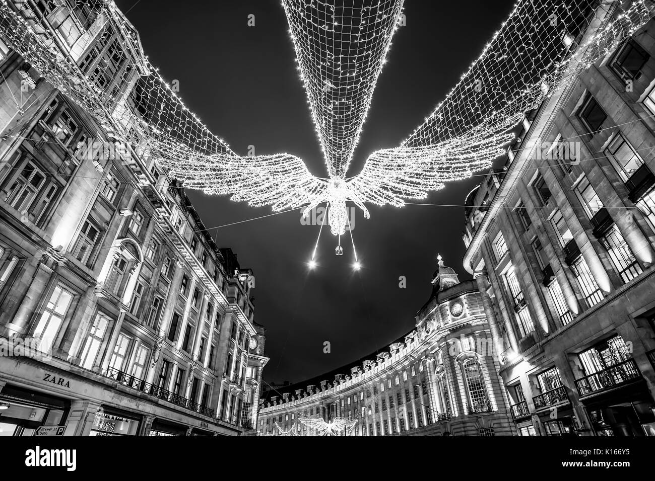 Huge angels made of lights hanging over Regent Street in London at ...