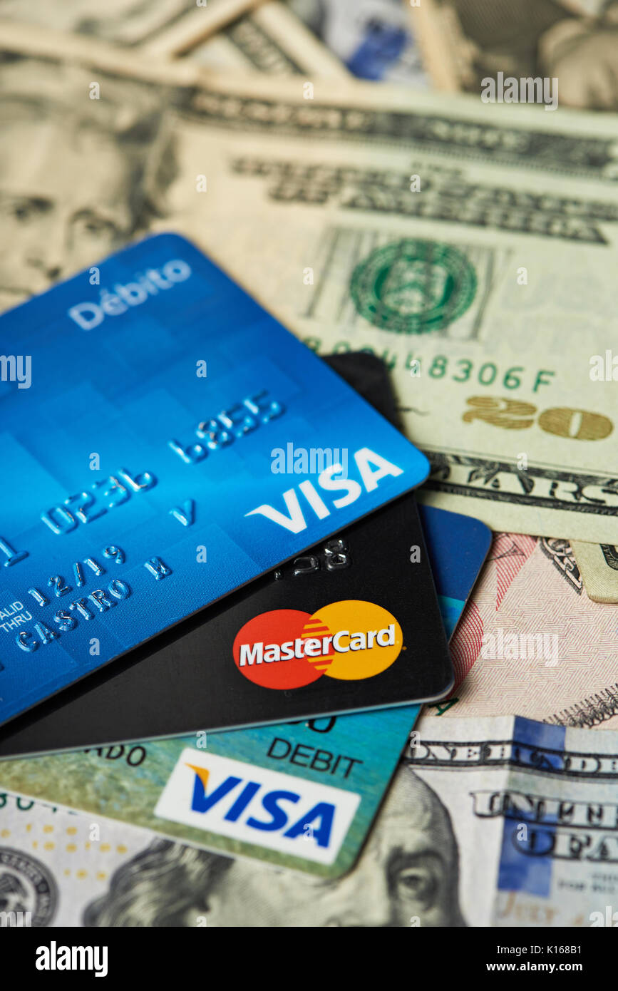 New york, USA - August 24, 2017: Stack of debit cards laying on dollar ...