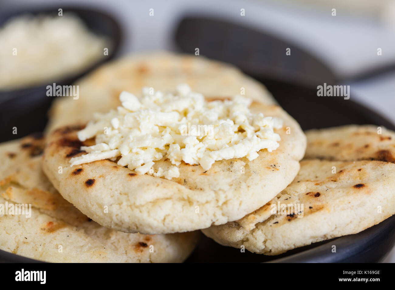 Traditional Colombian white corn arepa with cheese Stock Photo - Alamy