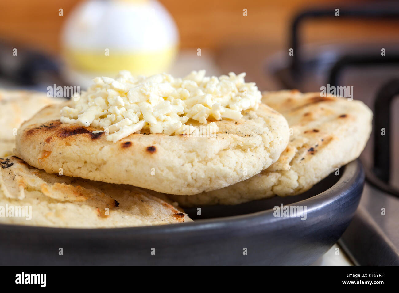 Traditional Colombian white corn arepa with cheese Stock Photo - Alamy