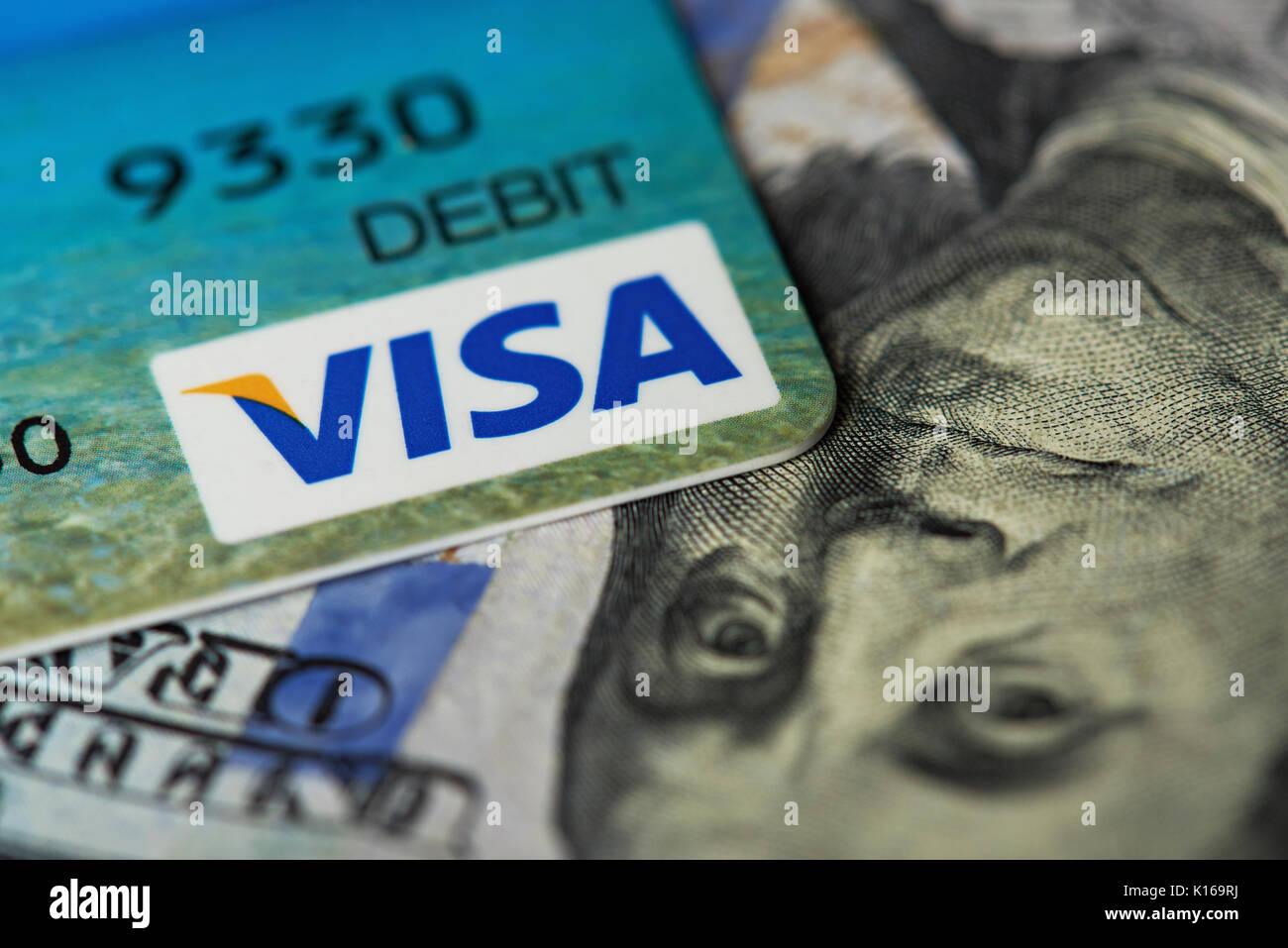 New york, USA - August 24, 2017:Close-up of visa card on dollar bill ...