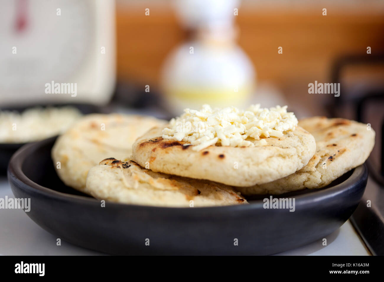 Traditional Colombian white corn arepa with cheese Stock Photo - Alamy