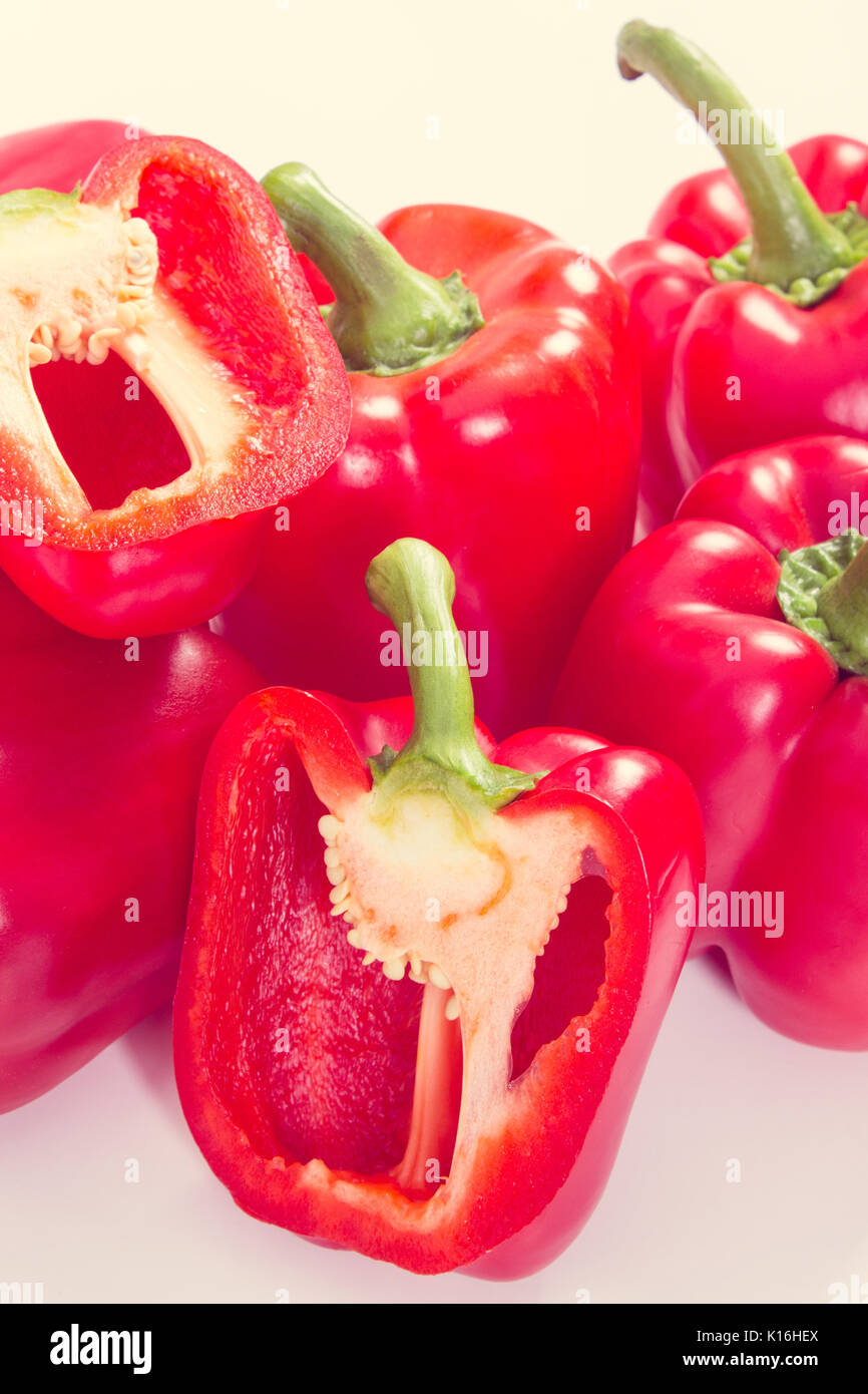 Vintage photo, Fresh red ripe peppers on white background, concept of ...