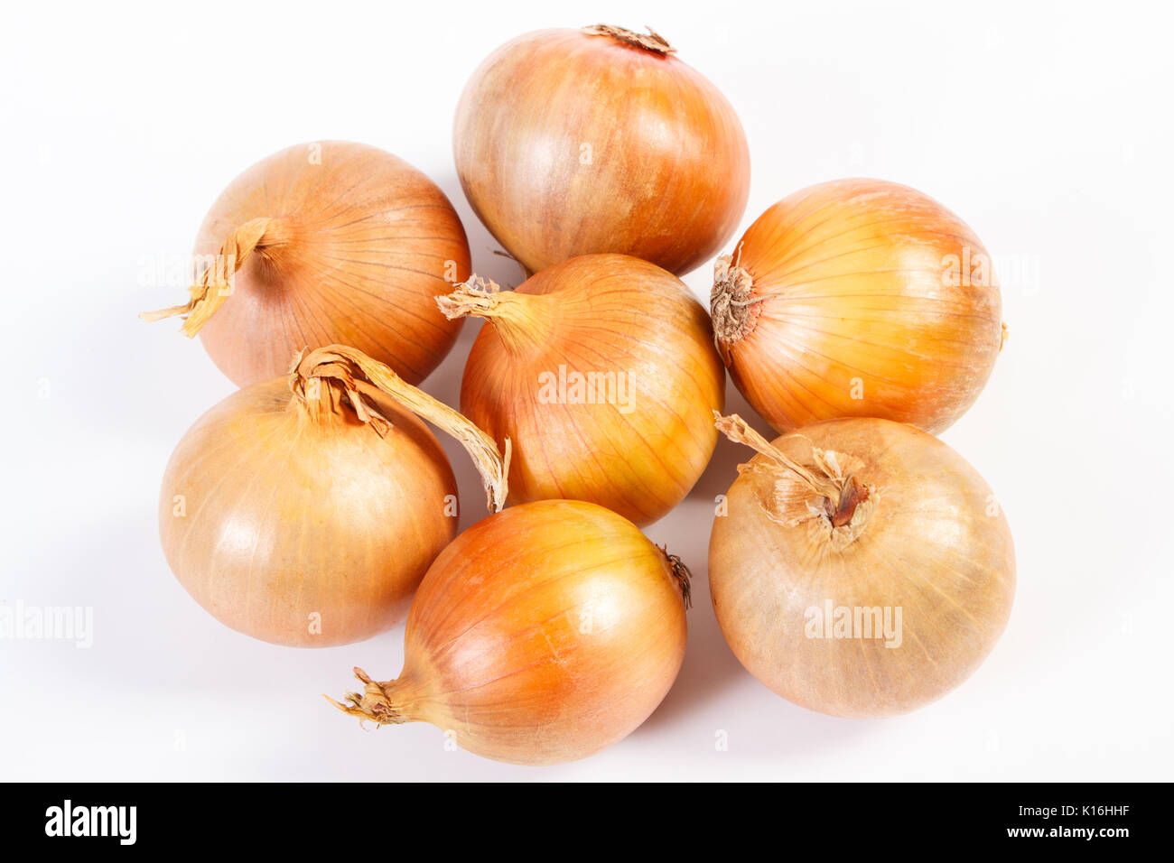 Heap of onions lying on white background, concept of healthy nutrition ...