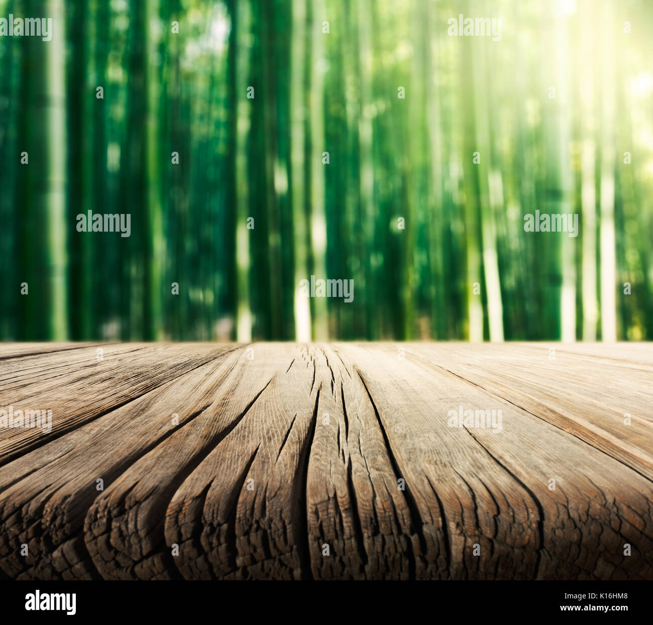 Empty wooden table with bamboo forest background Stock Photo - Alamy