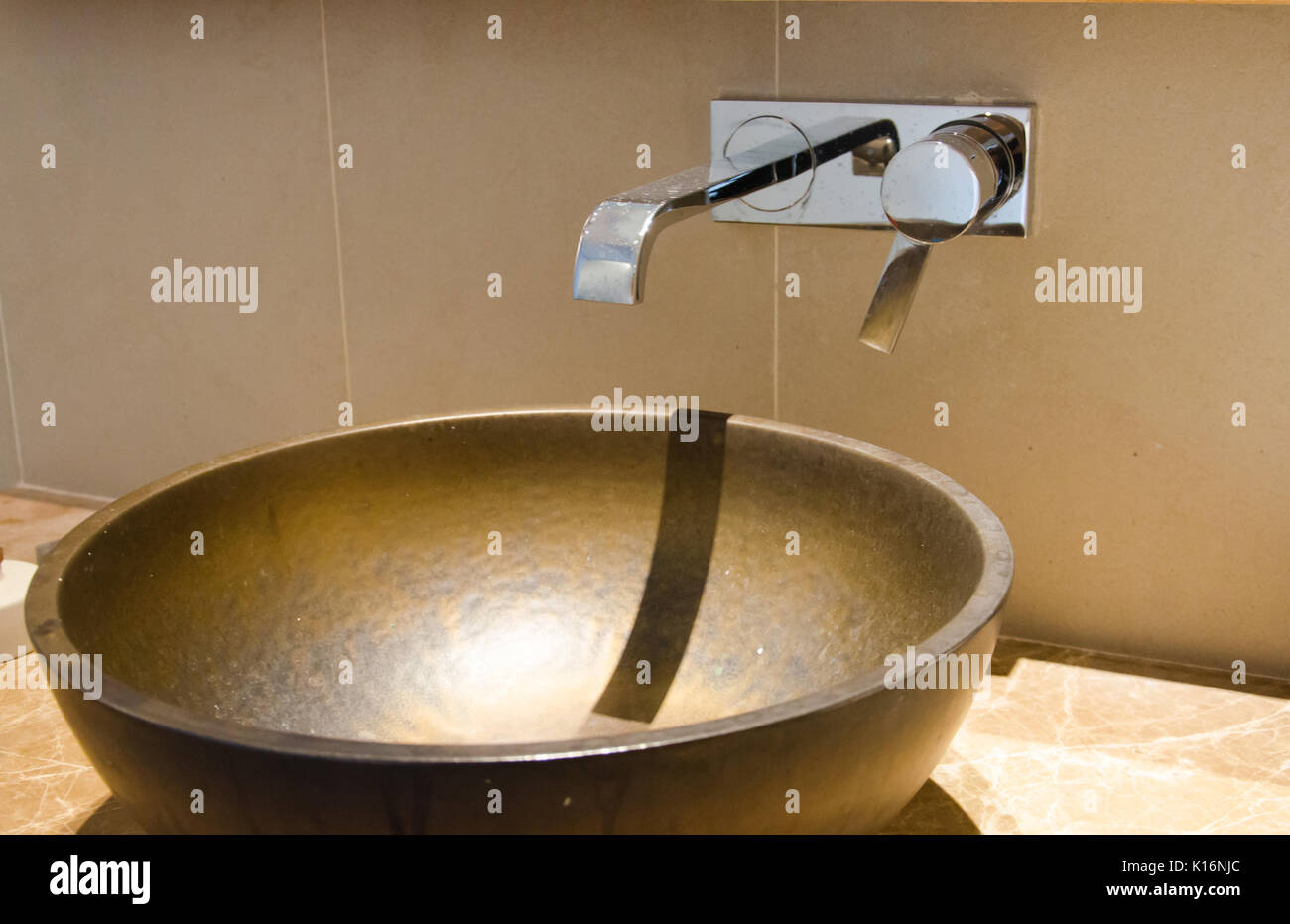 Bathroom interior with sink and faucet Stock Photo - Alamy