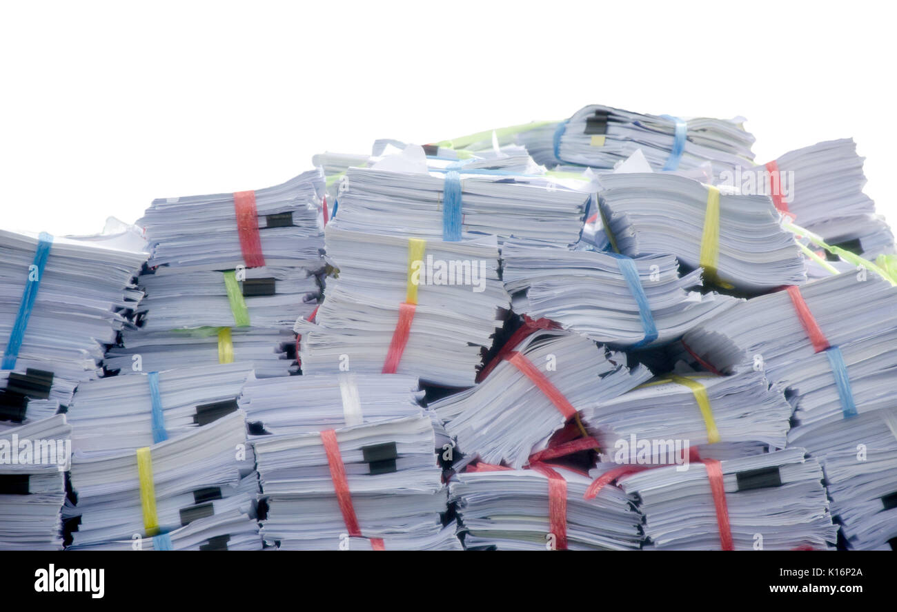 Document binding piled on a white background Stock Photo - Alamy