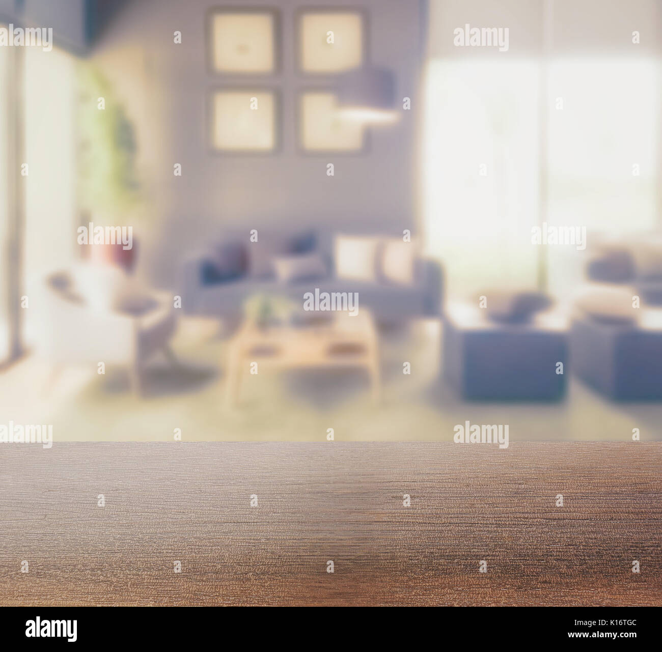 wooden table top with blur background of modern living room interior ...