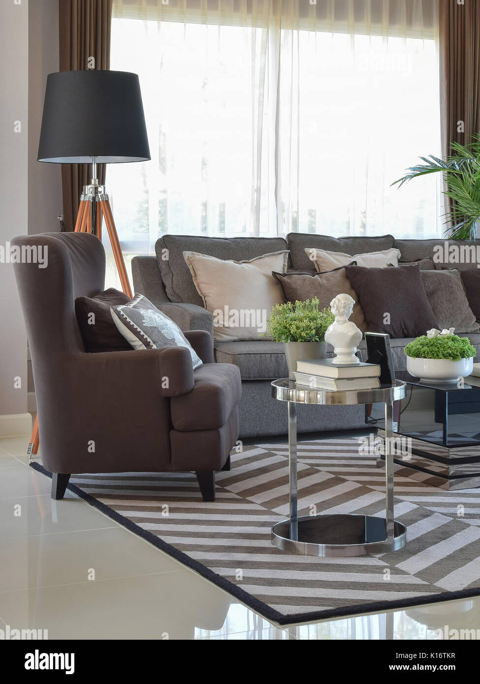 modern living room design with sofa and wooden lamp Stock Photo - Alamy