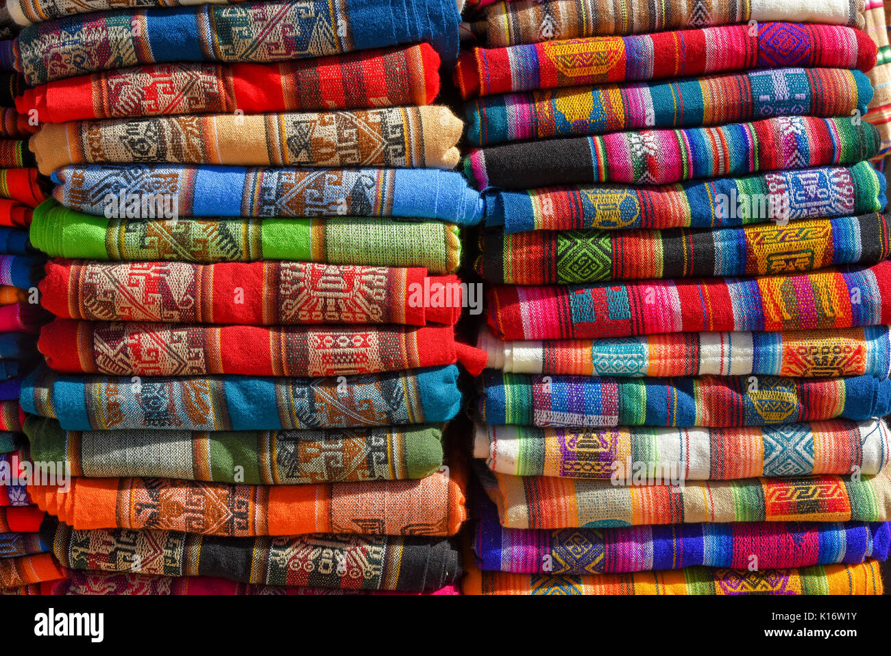 A pile of colorful rugged Peruvian textile and fabrics Stock Photo - Alamy
