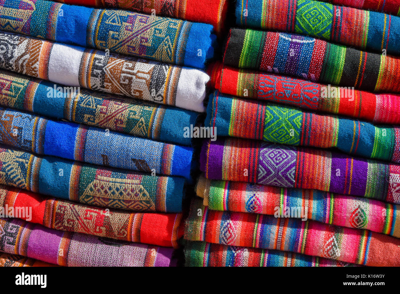 A pile of colorful rugged Peruvian textile and fabrics Stock Photo - Alamy
