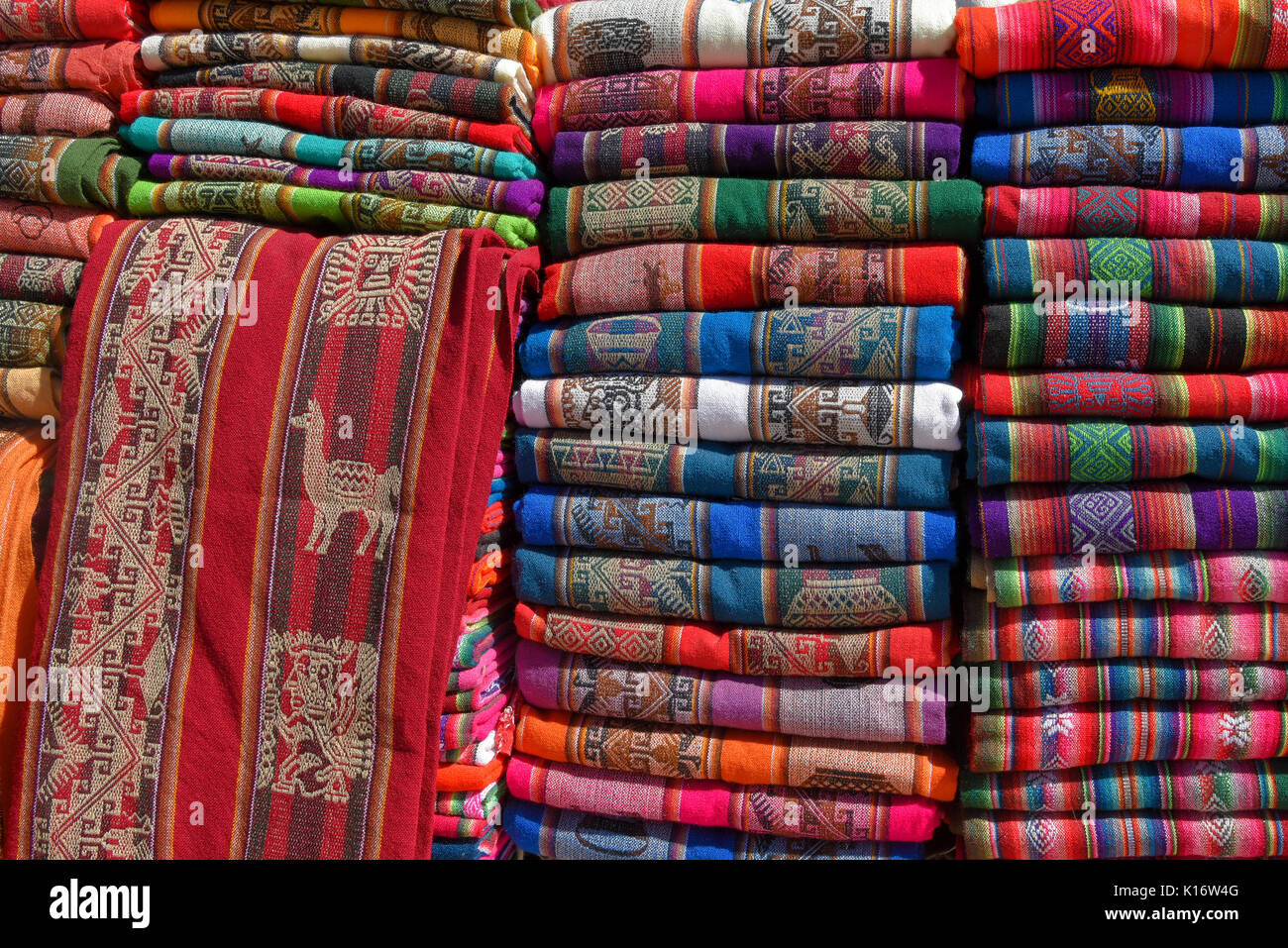 A pile of colorful rugged Peruvian textile and fabrics Stock Photo - Alamy
