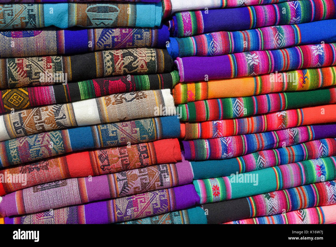 A pile of colorful rugged Peruvian textile and fabrics Stock Photo - Alamy