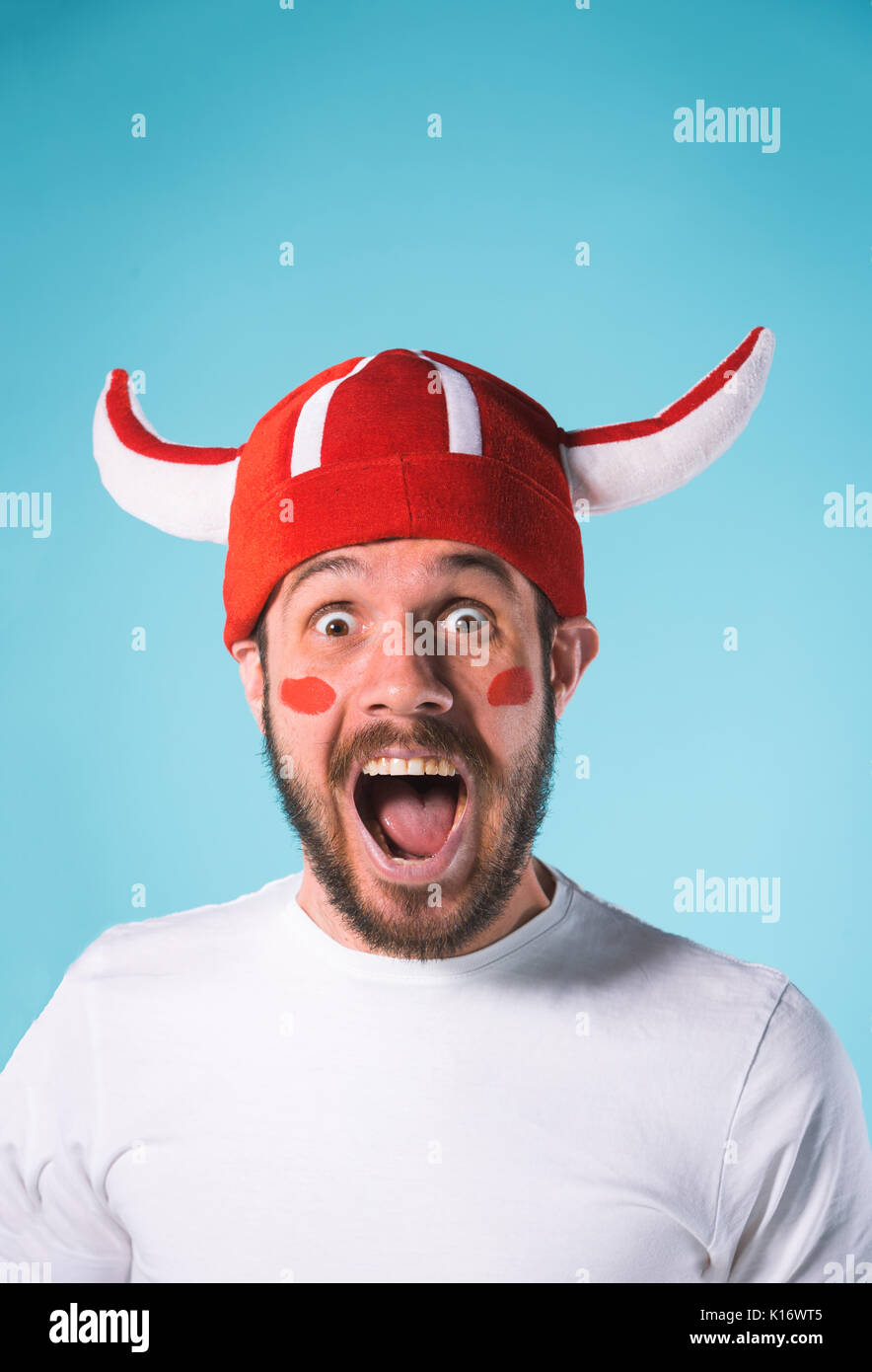 The football fan over blue Stock Photo - Alamy
