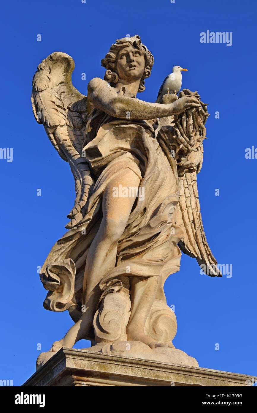 angel statue of the Ancient bridge in front of Castel Sant Angelo, Rome ...