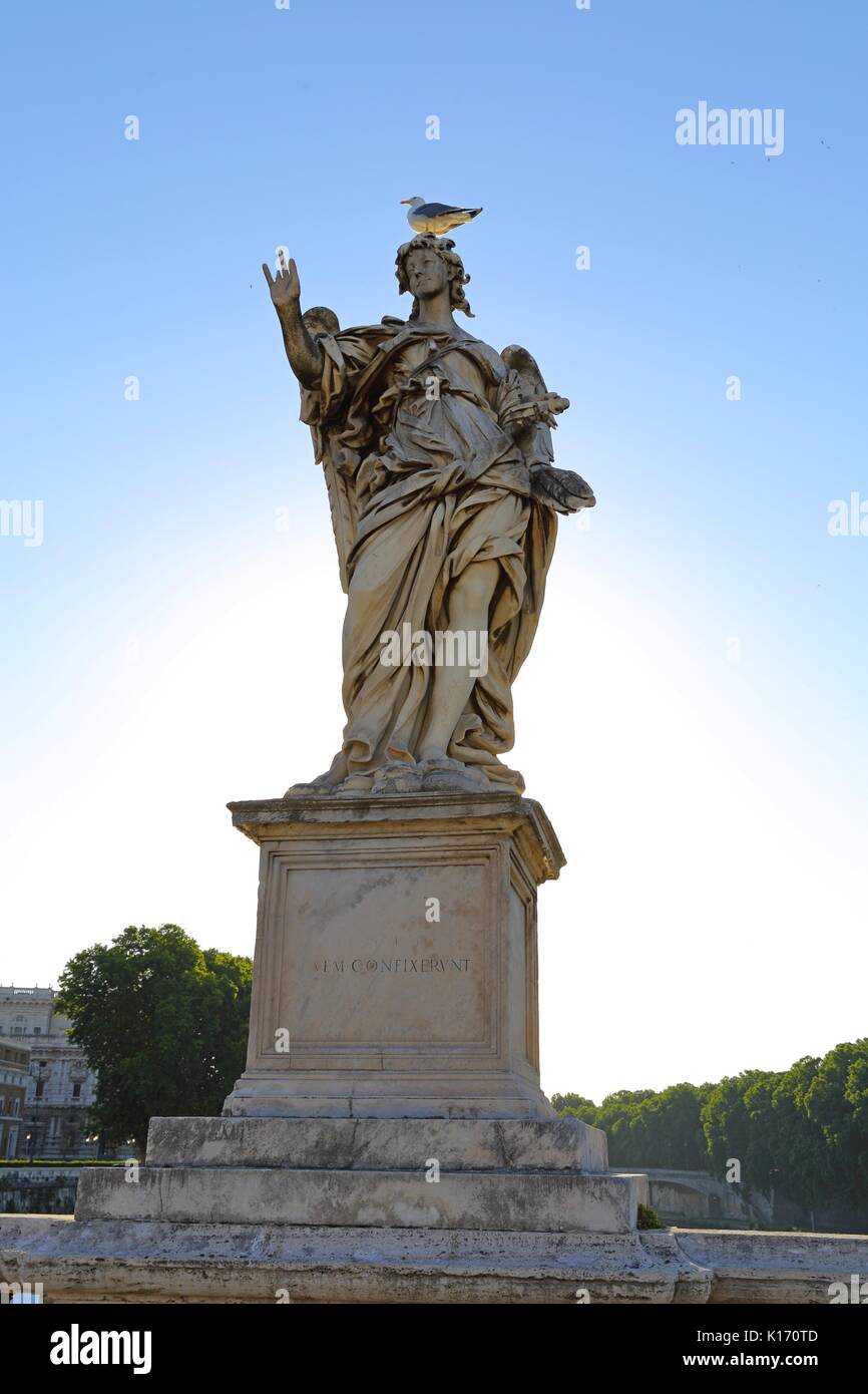angel statue of the Ancient bridge in front of Castel Sant Angelo, Rome ...