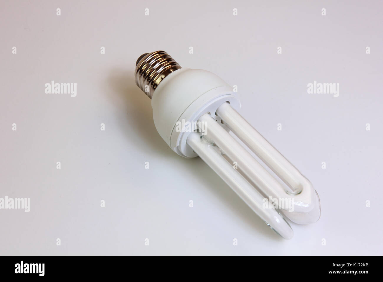 Economy money save bulb Stock Photo - Alamy