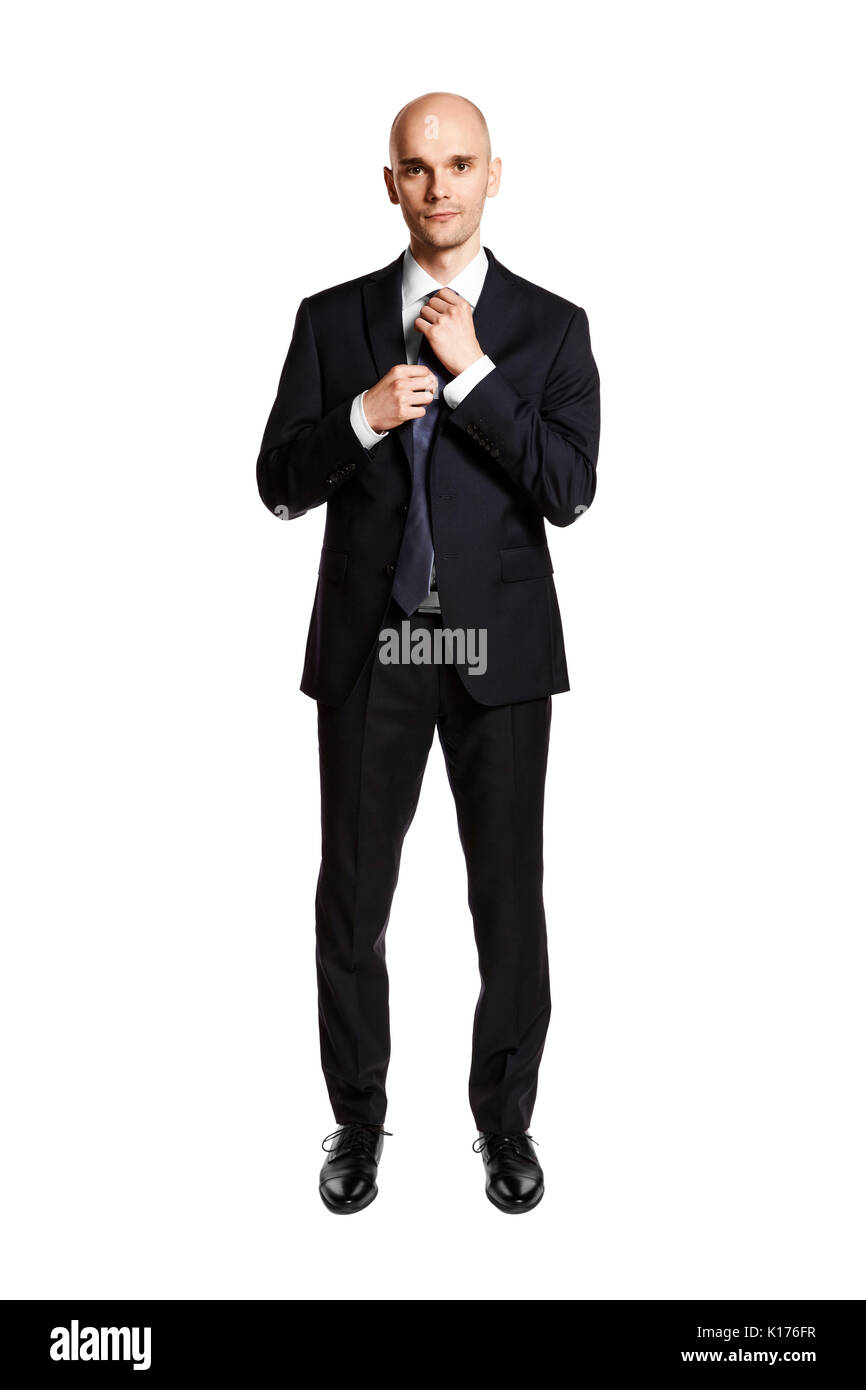 Studio shot of young man getting ready isolated on white background ...