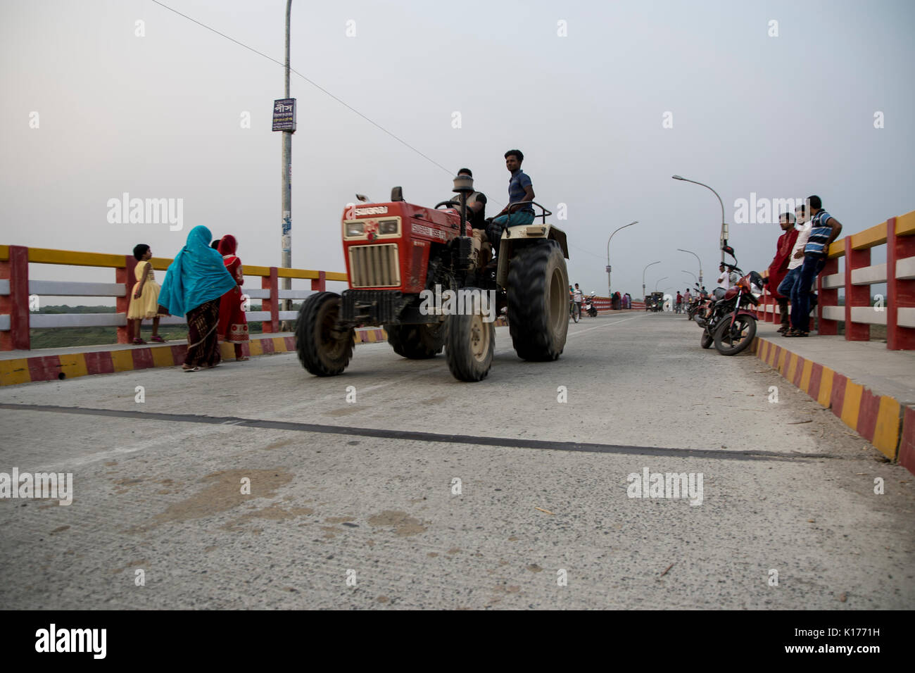 Tractor in village hi-res stock photography and images - Alamy