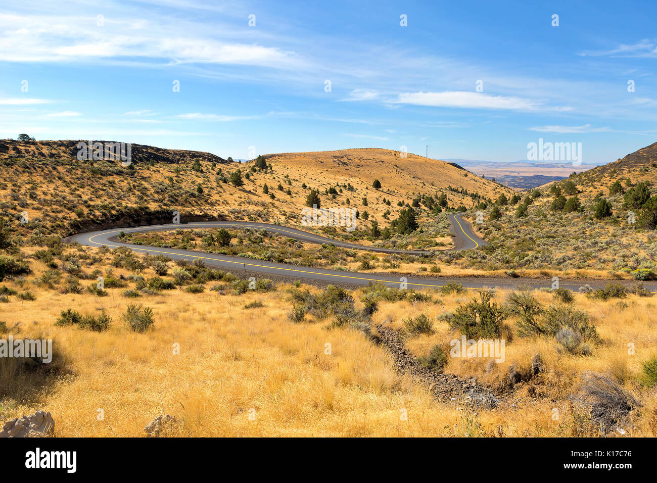 The long winding road in Central Oregon high desert on a beautiful ...