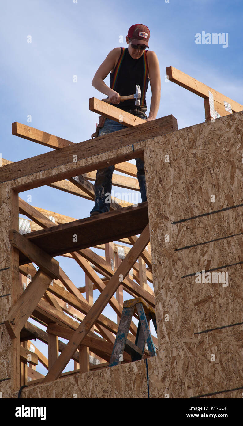 Man builds roof for home for Habitat For Humanity For Humanity. El ...