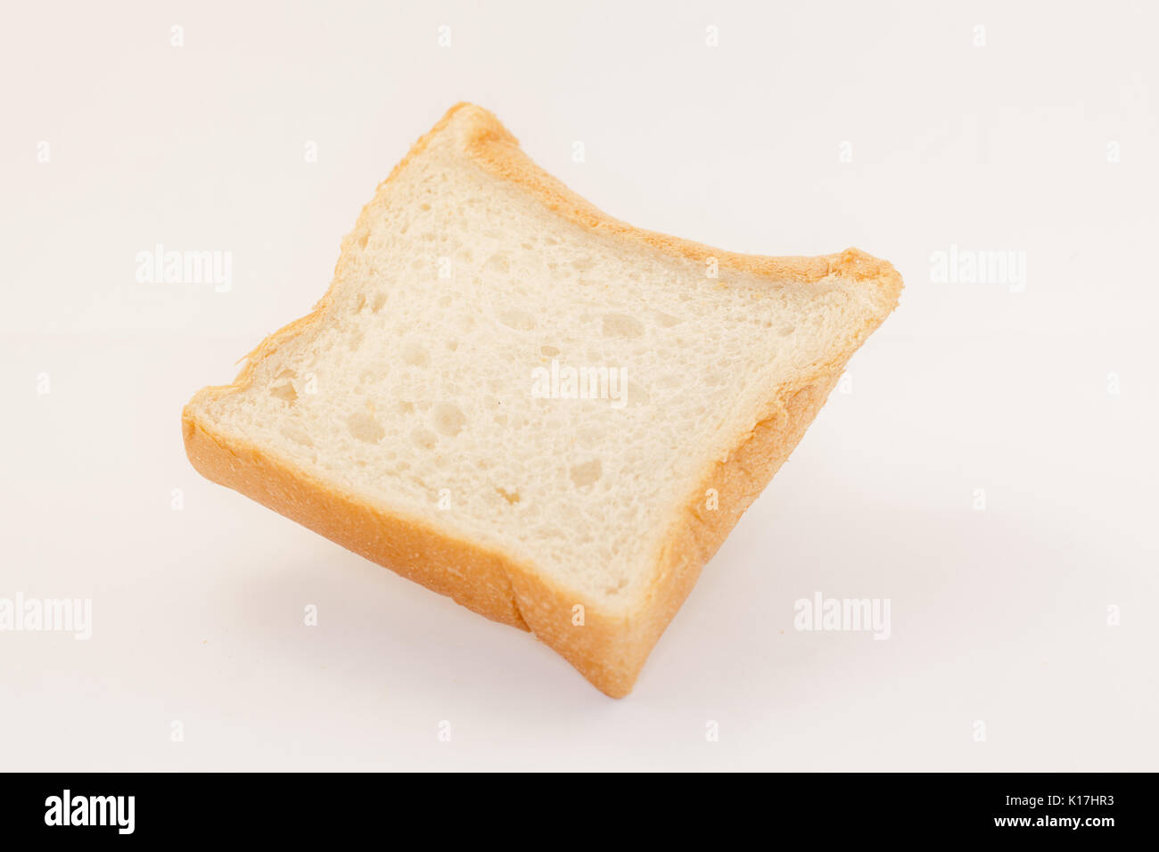 Bread sheet on white background Stock Photo - Alamy