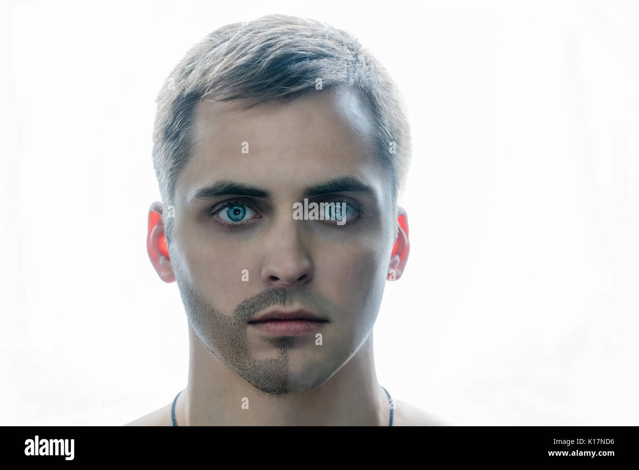 Portrait of man with half shaved beard. Skin care and hygiene. A guy ...