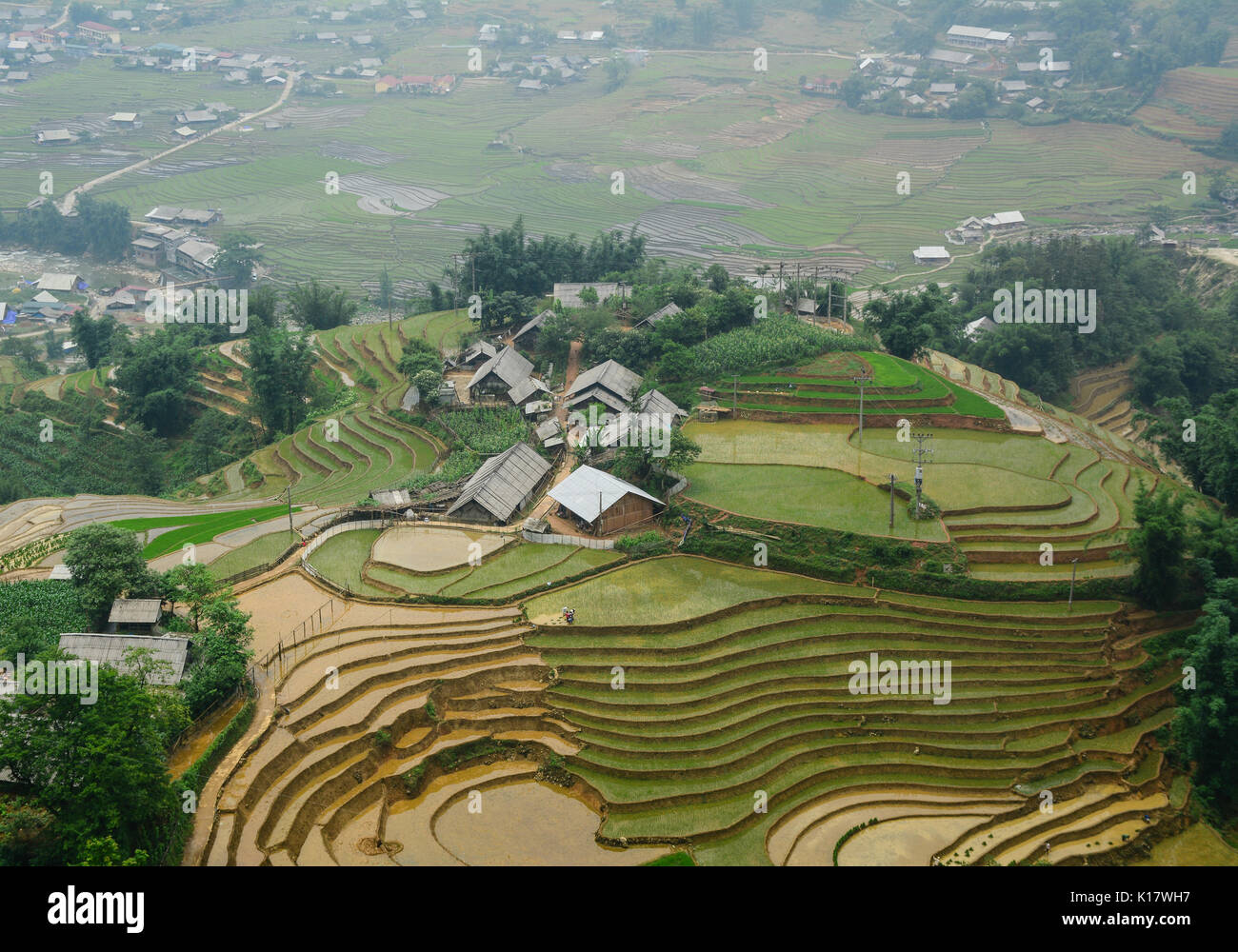 Terraced rice fields with small village at rain season in Northern ...