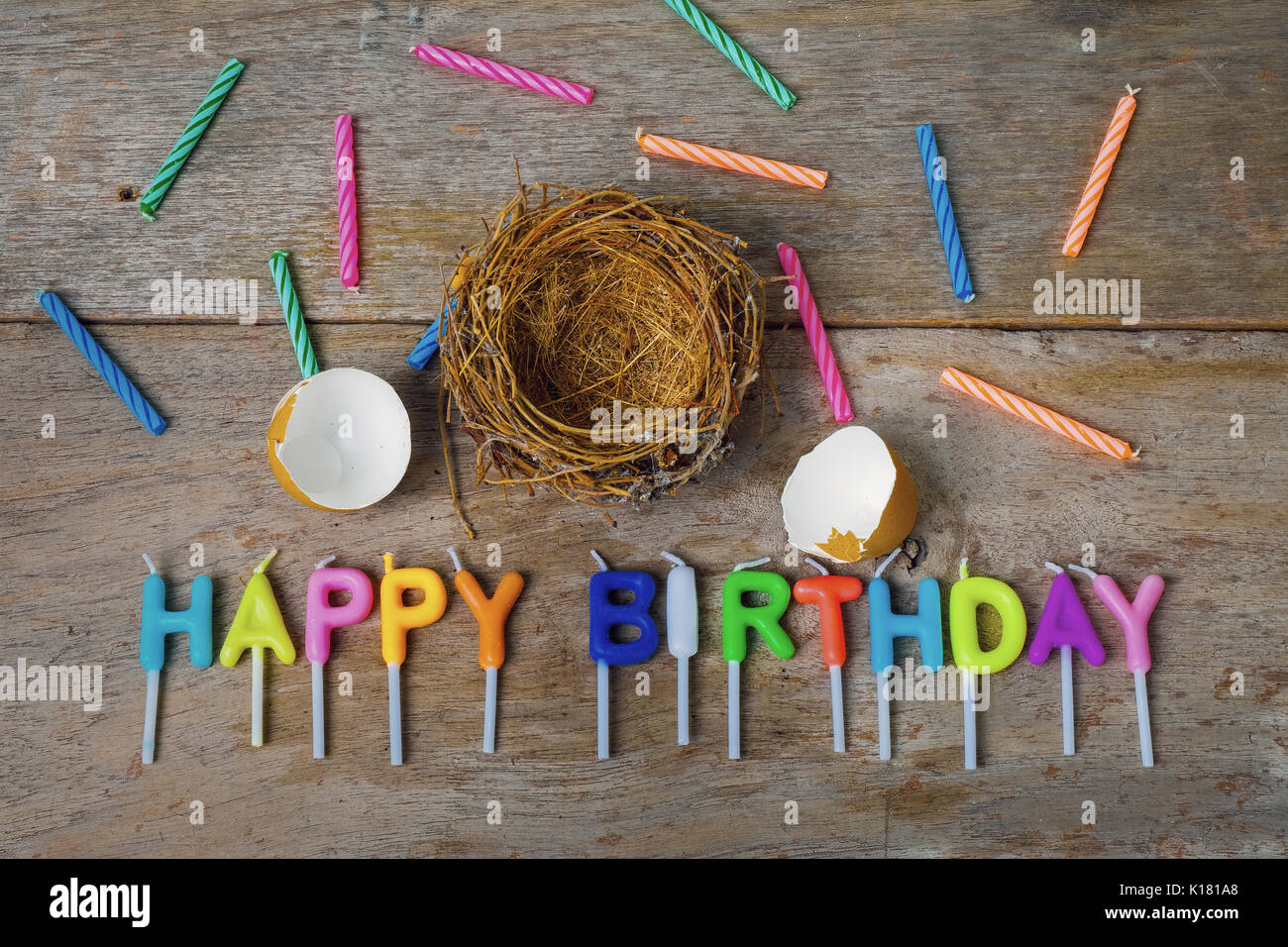 Shattered Eggshell With Nest and Candle for Happy Birthday Concept ...