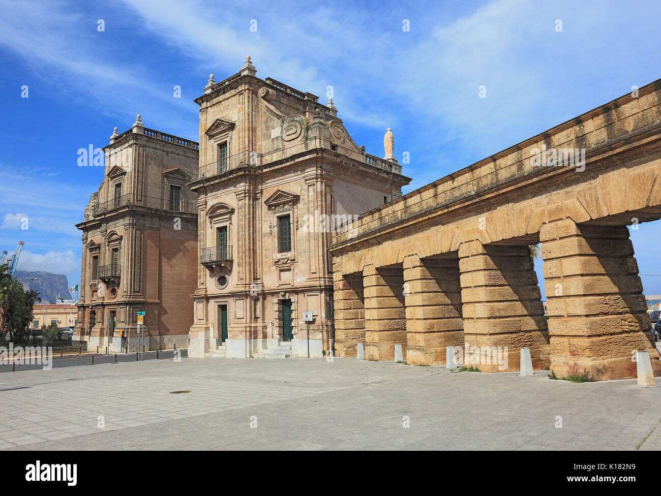 Sicily, in the old town of Palermo, the historic gate Porta Felice near ...