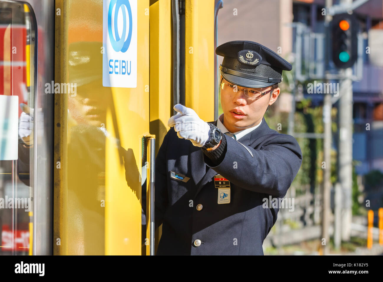 TOKYO, JAPAN - NOVEMBER 23: Train Conductor in Tokyo, Japan on November ...