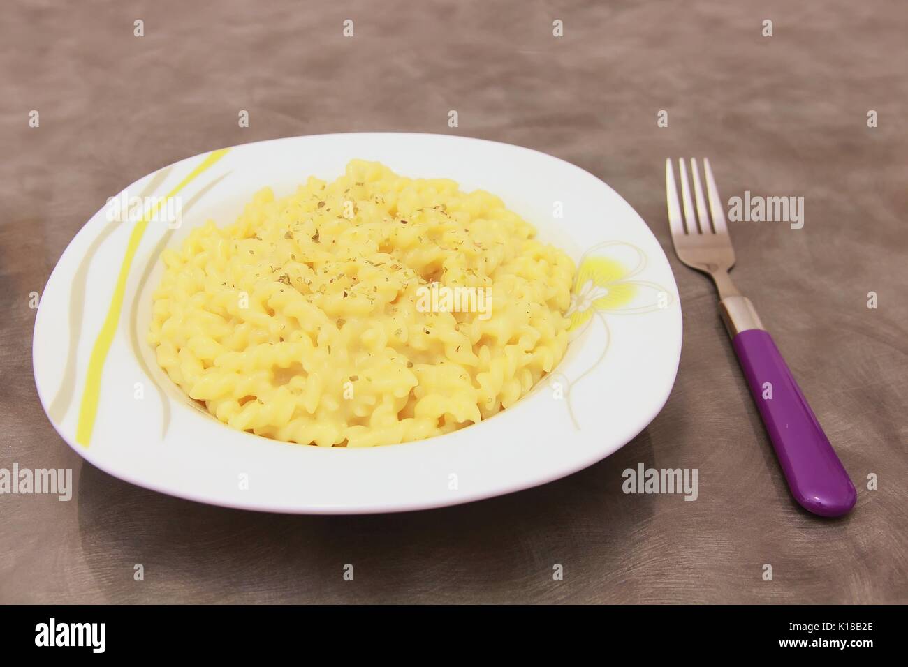 Italian pasta on white plate Stock Photo - Alamy