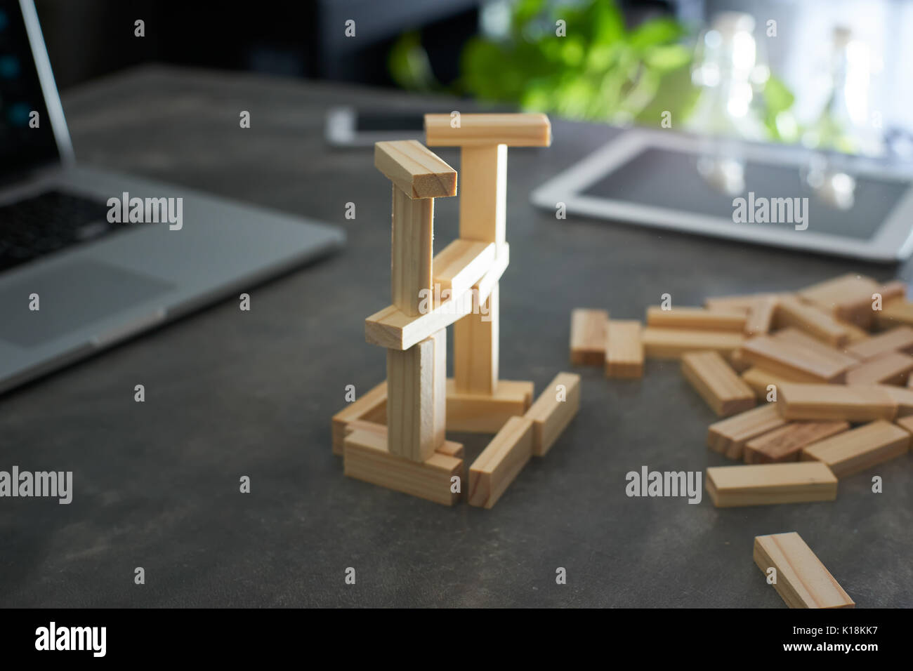 Brown wood building block tower with blur background .Selected focusing ...