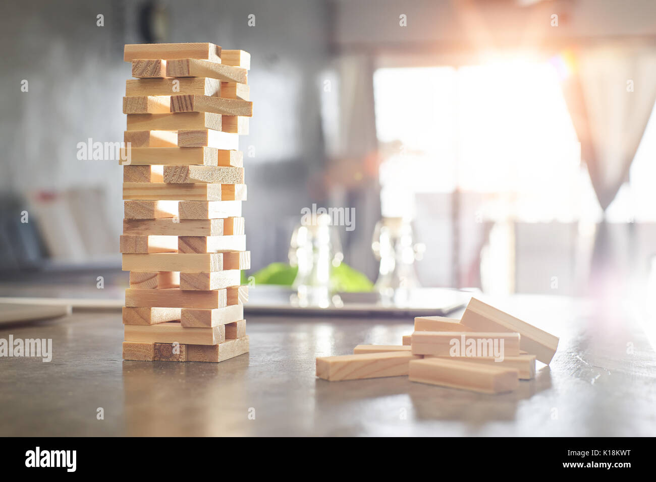 Brown wood building block tower with blur background .Selected focusing ...