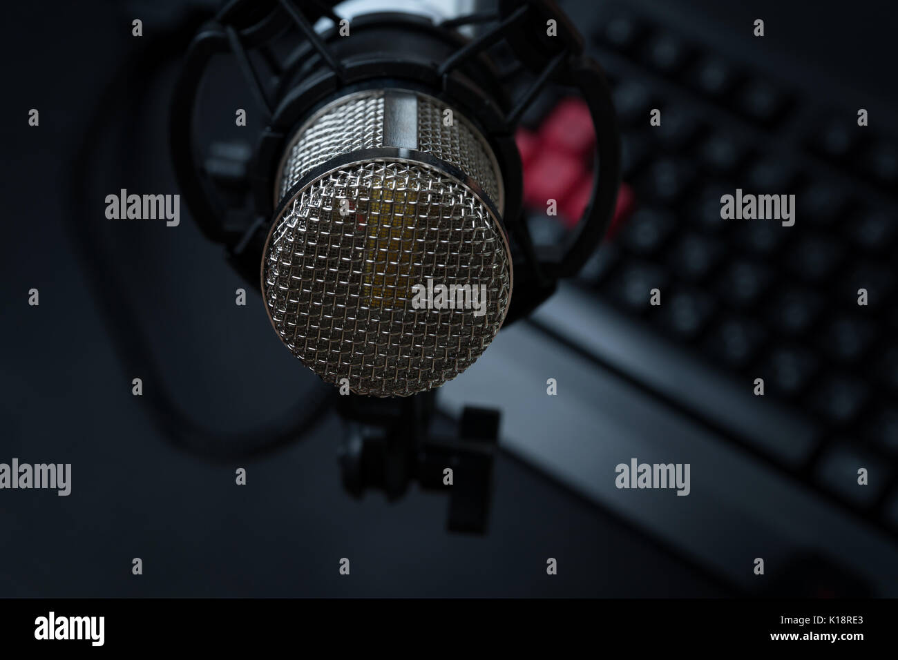 Professional condenser studio microphone over the keyboard Stock Photo ...